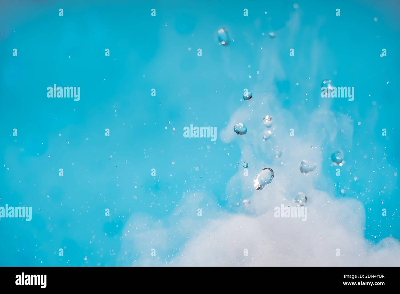 Water drop. Chemical reaction with boiling swirling water splashes ...