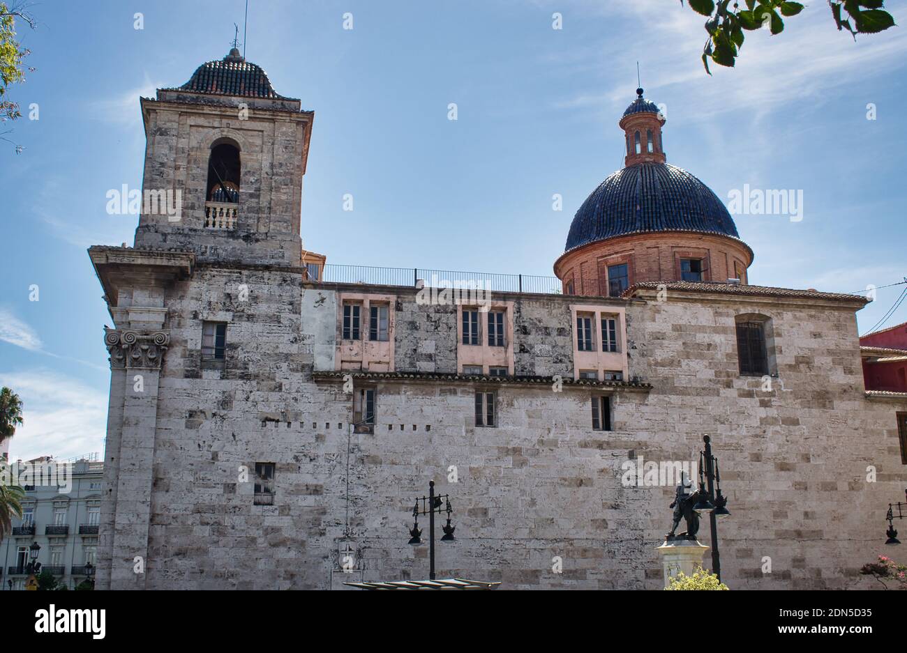 The bell tower and dome with blue tiles of the Iglesia del Temple in ...