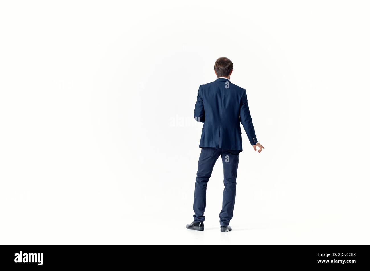 business man puzzled look light background suit gesturing with hands ...