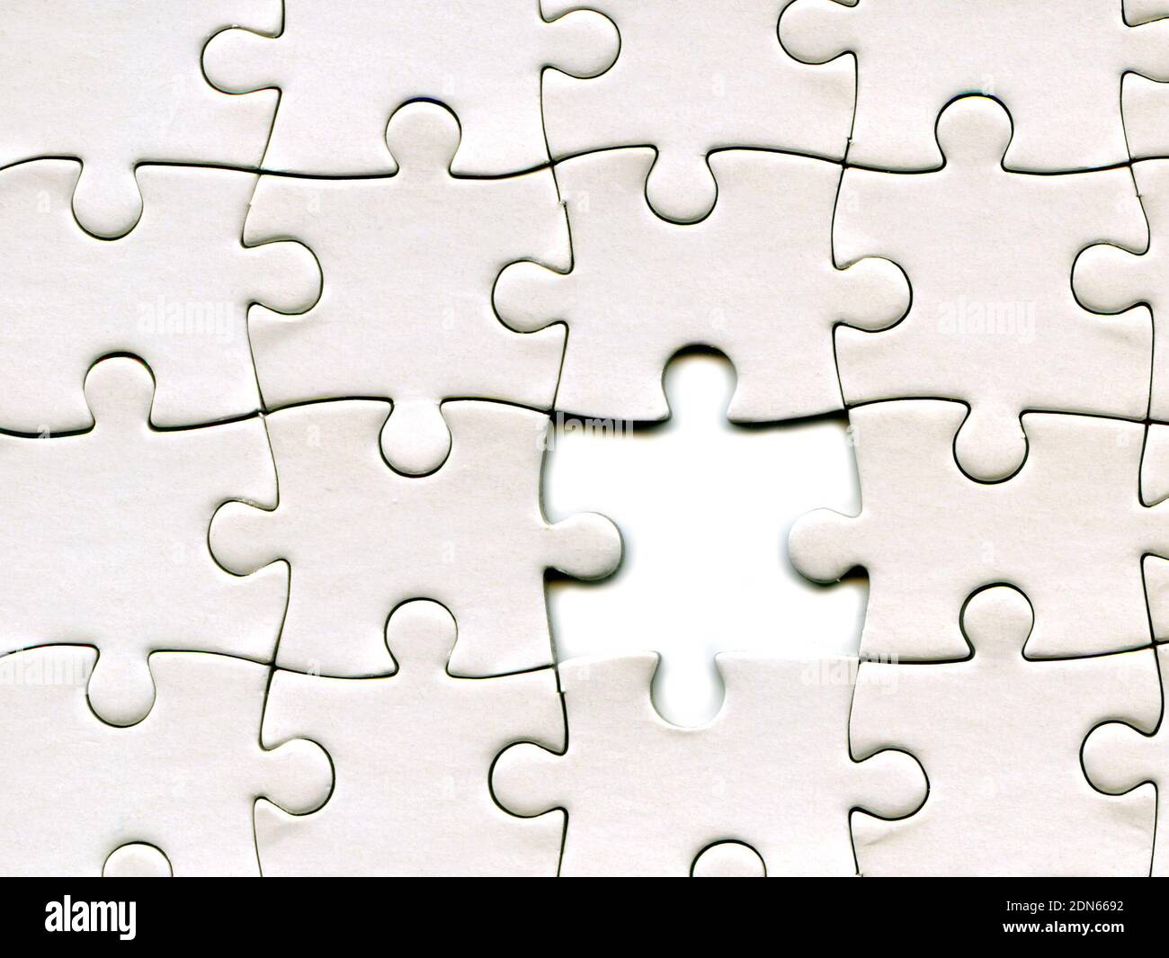 puzzle pieces with missing peace Stock Photo - Alamy