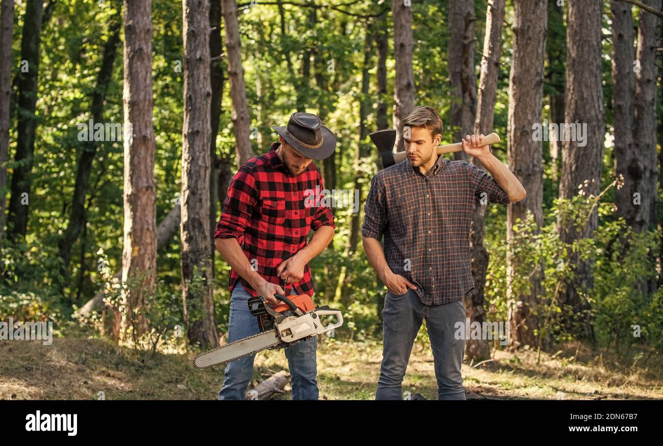 Best way to relax. man forester use saw and axe. search firewood for ...