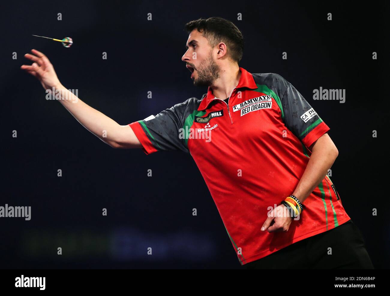 Jamie Lewis in action during day three of the William Hill World Darts ...