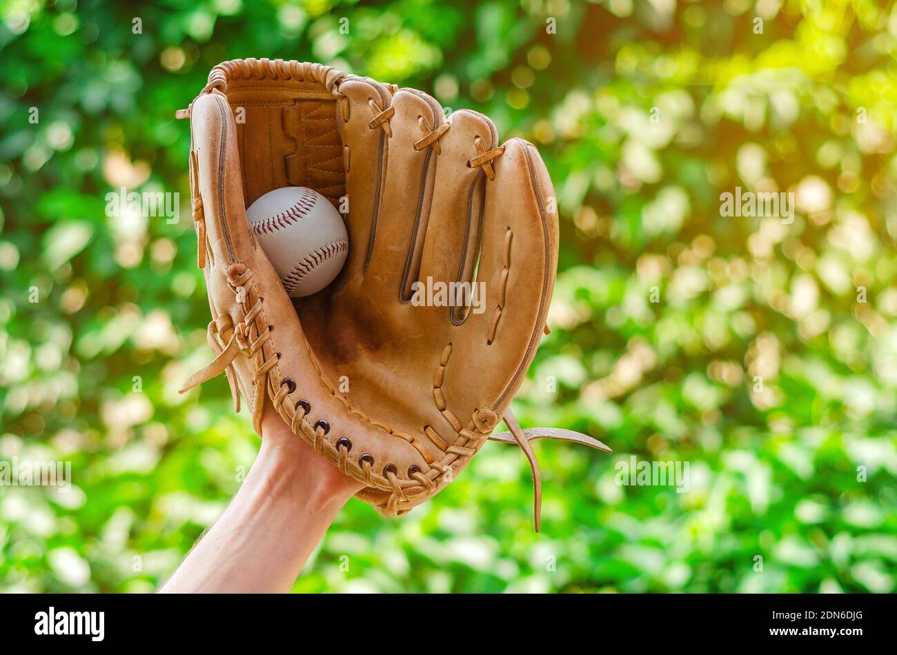 Hand catching ball close up hi-res stock photography and images - Alamy