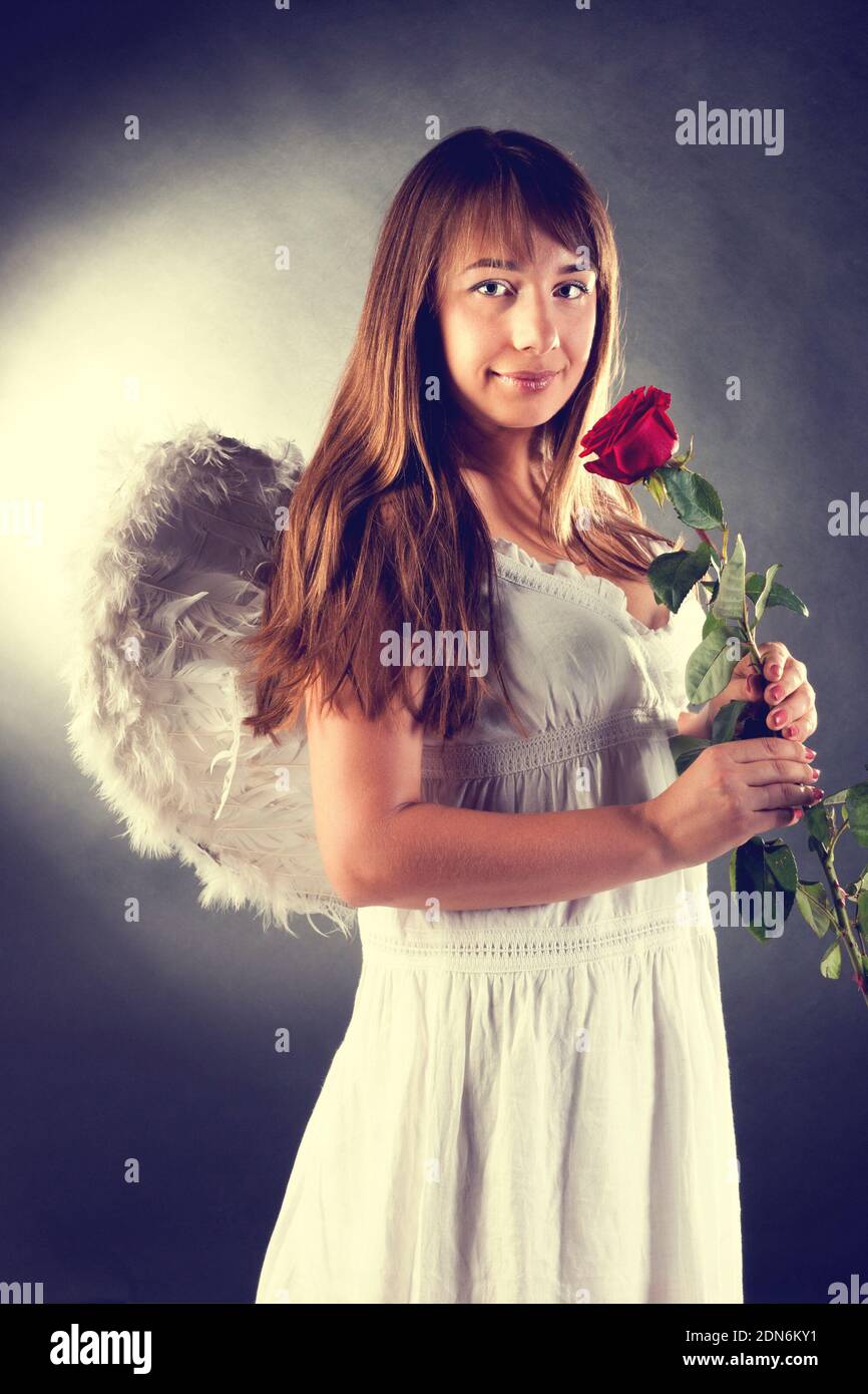 Woman angel costume hi-res stock photography and images - Alamy