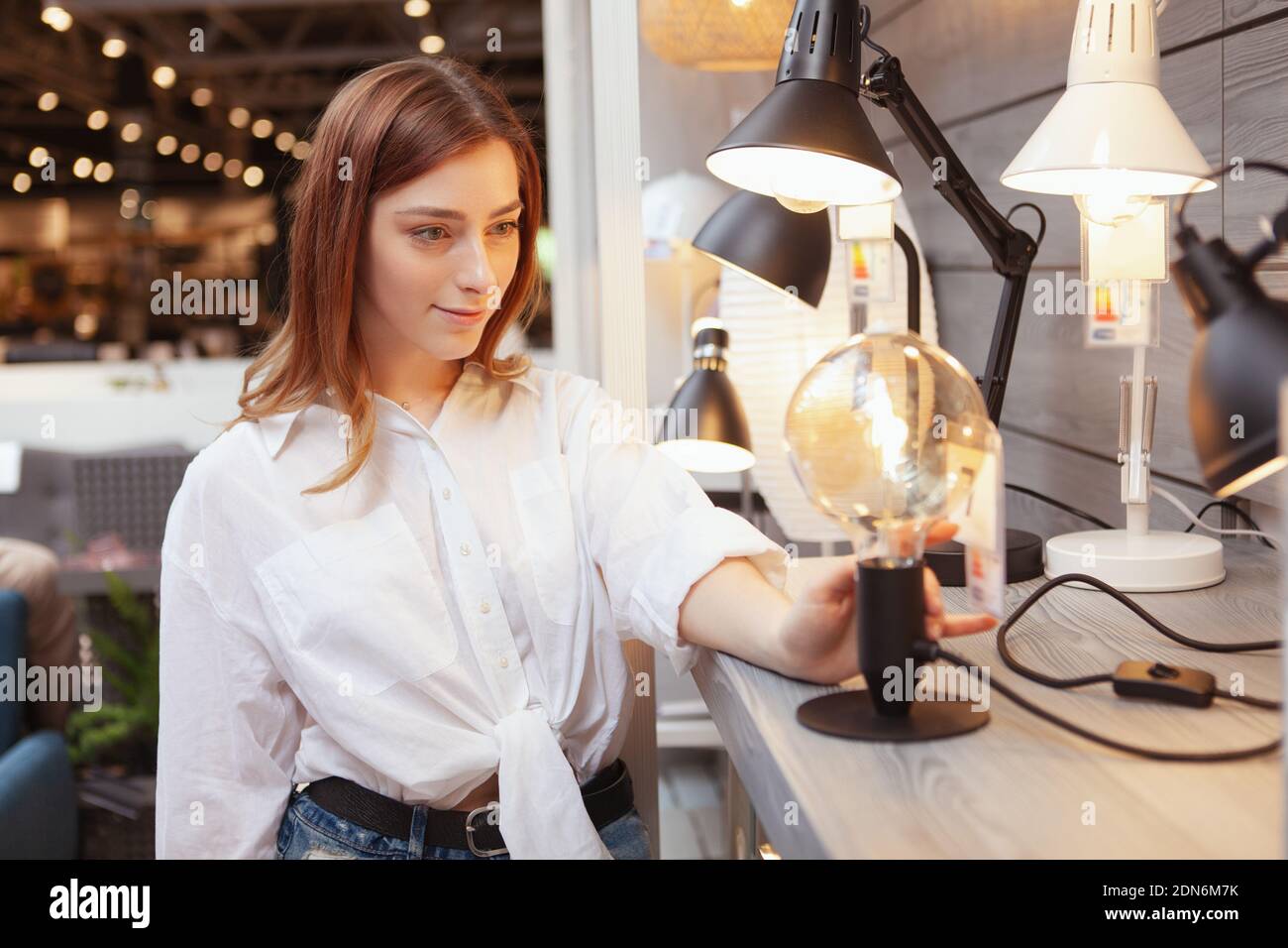 Lamp lights shop customer hi-res stock photography and images - Alamy