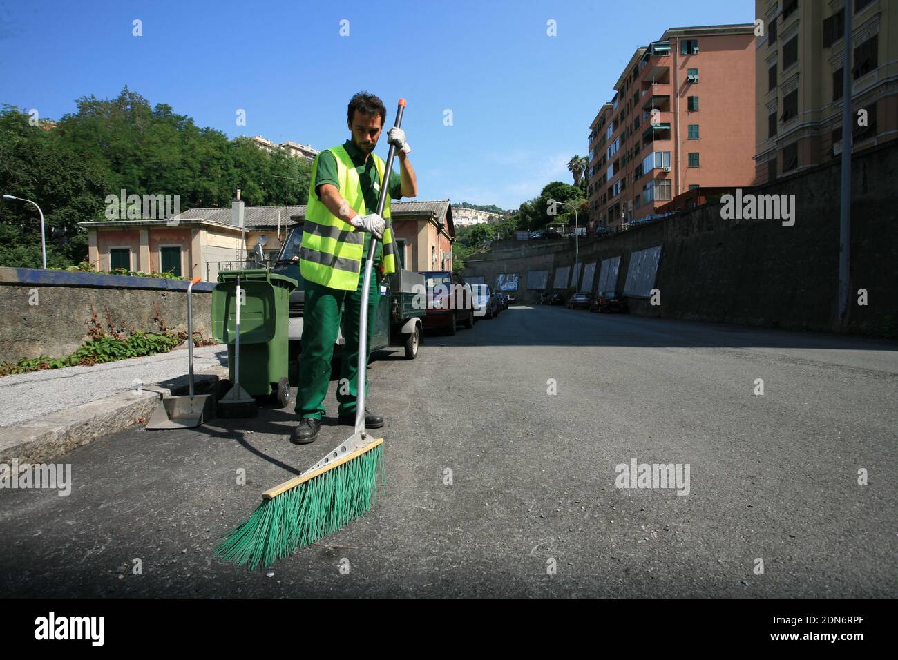 Man sweeping road hi-res stock photography and images - Alamy
