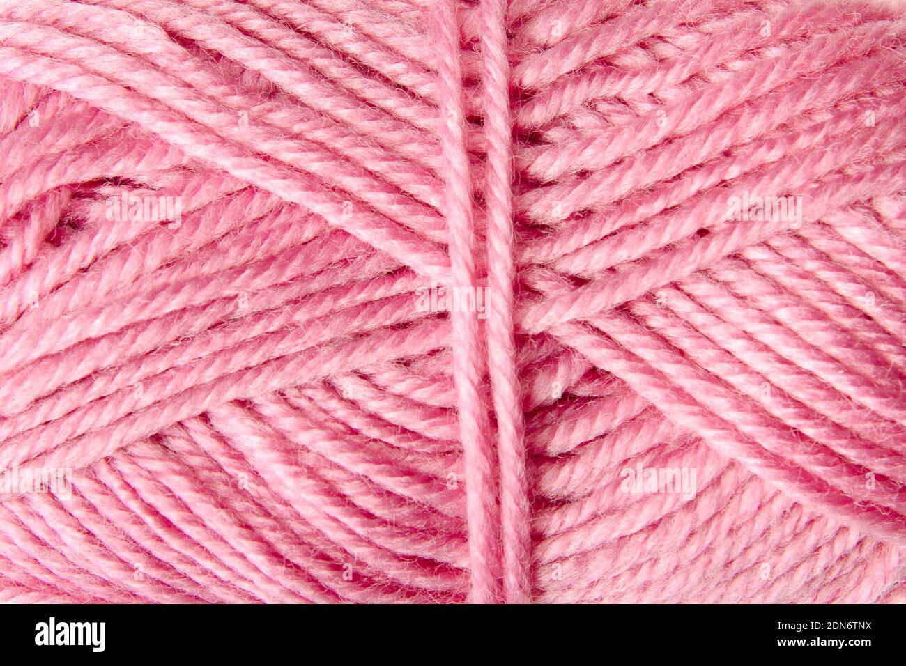 pink yarn as a background Stock Photo - Alamy