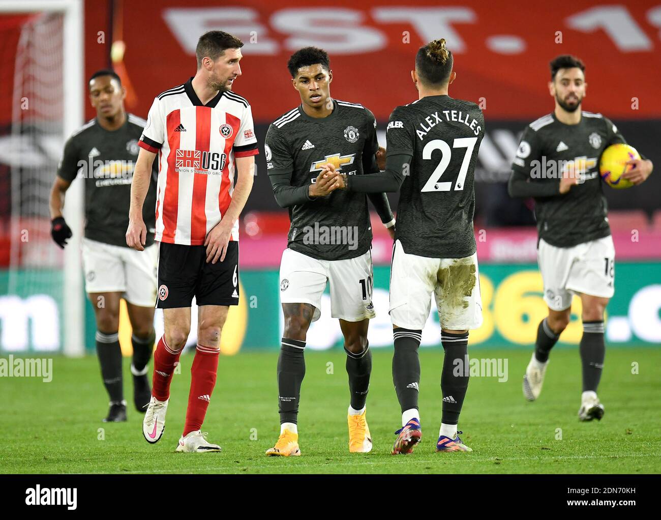 Manchester United's Marcus Rashford (centre) celebrates scoring his ...