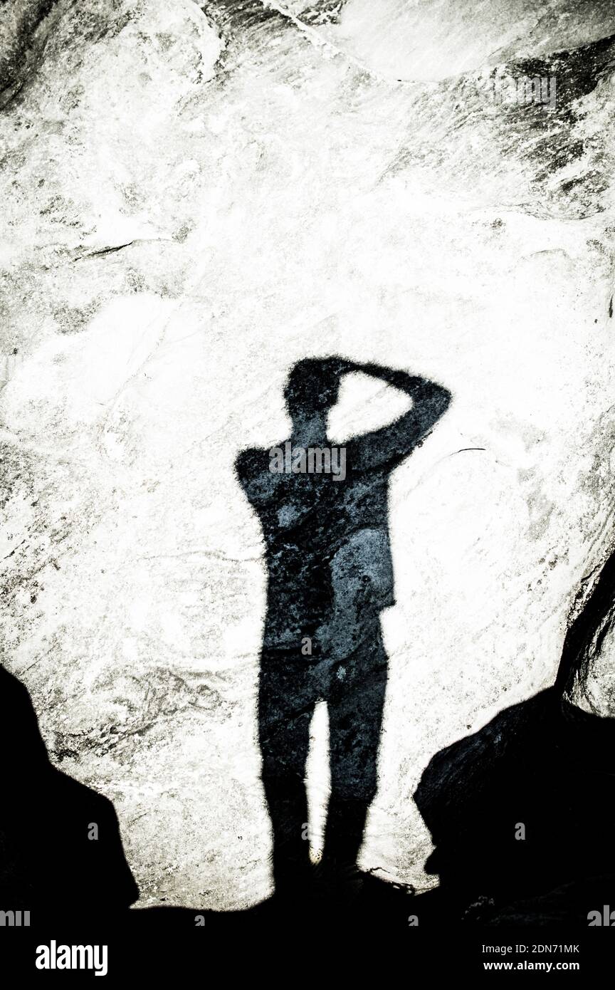 Self-portrait of a shadow on a rock Stock Photo - Alamy