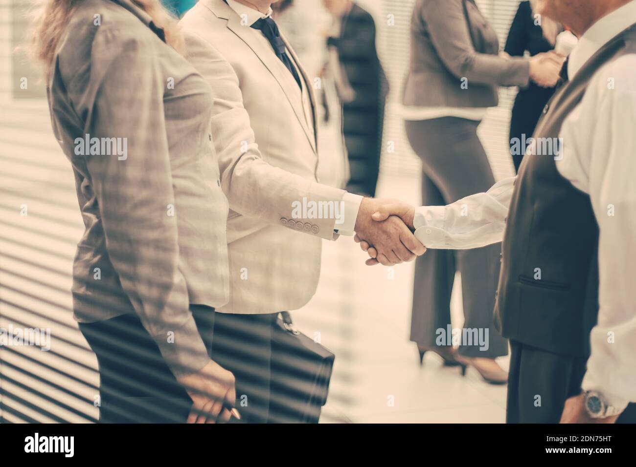 business people shaking hands in the Bank office Stock Photo - Alamy