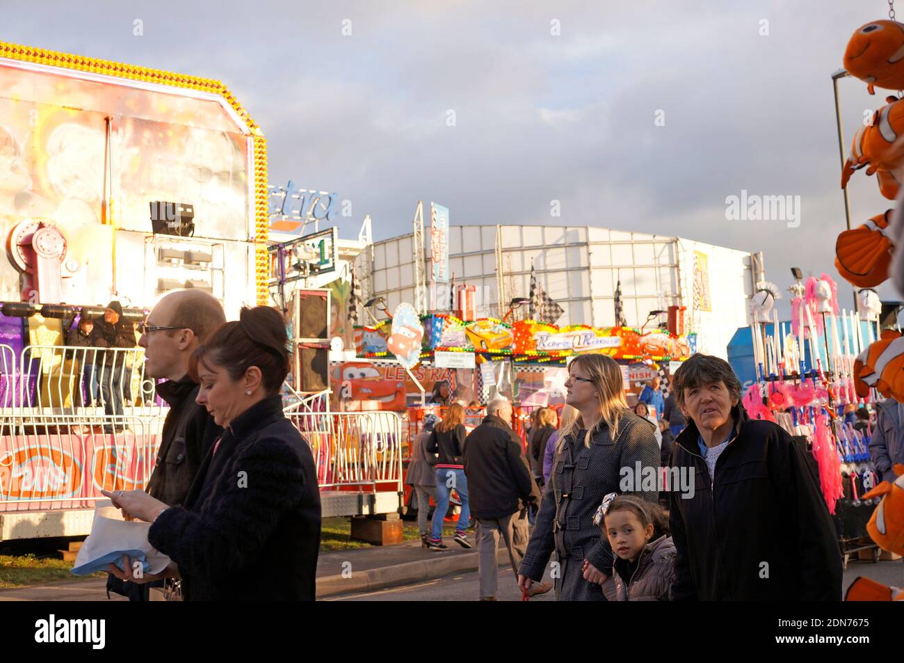 People mixing at a street fair Stock Photo - Alamy