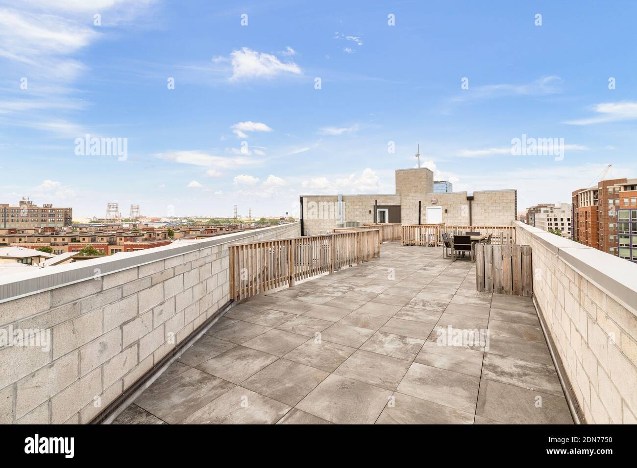 A rooftop patio on a Chicago condo building. The rooftop has plenty of ...