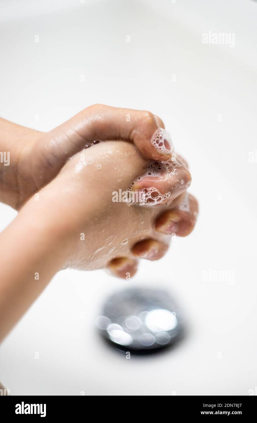 Person rubbing hands together hi-res stock photography and images - Alamy