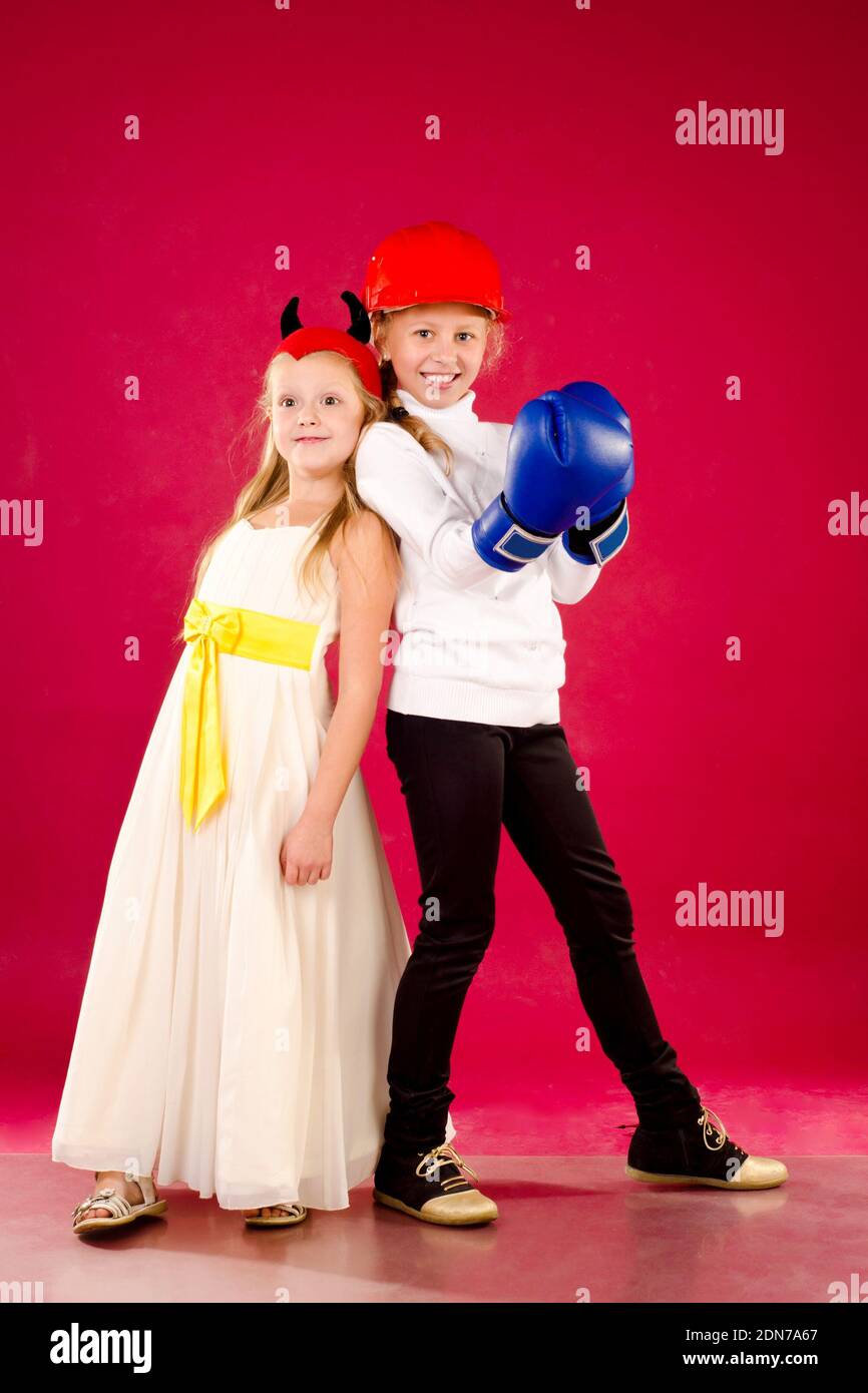 two little girls playing in studio Stock Photo - Alamy