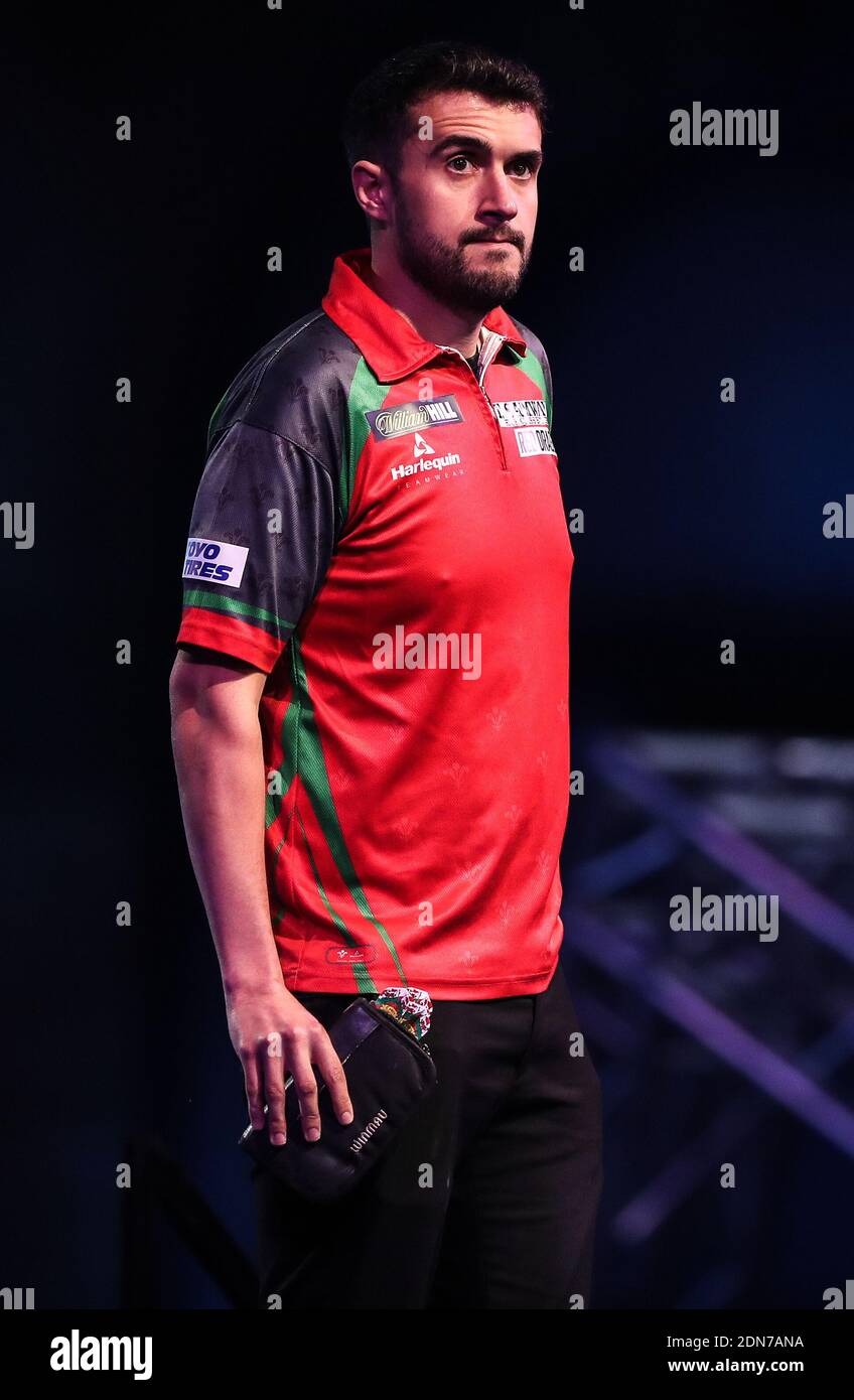 Jamie Lewis in action during day three of the William Hill World Darts ...