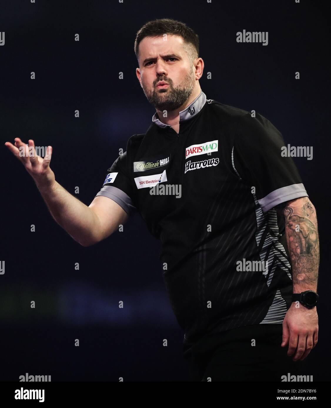 Luke Woodhouse reacts during day three of the William Hill World Darts ...