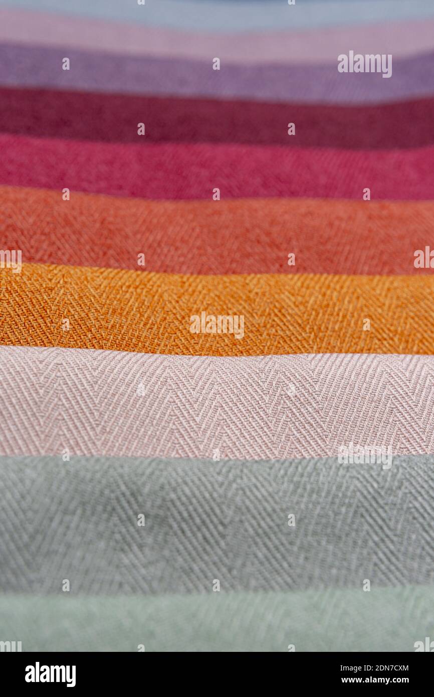 Curtain layers of colored fabric sample swaps for comparison and pick ...