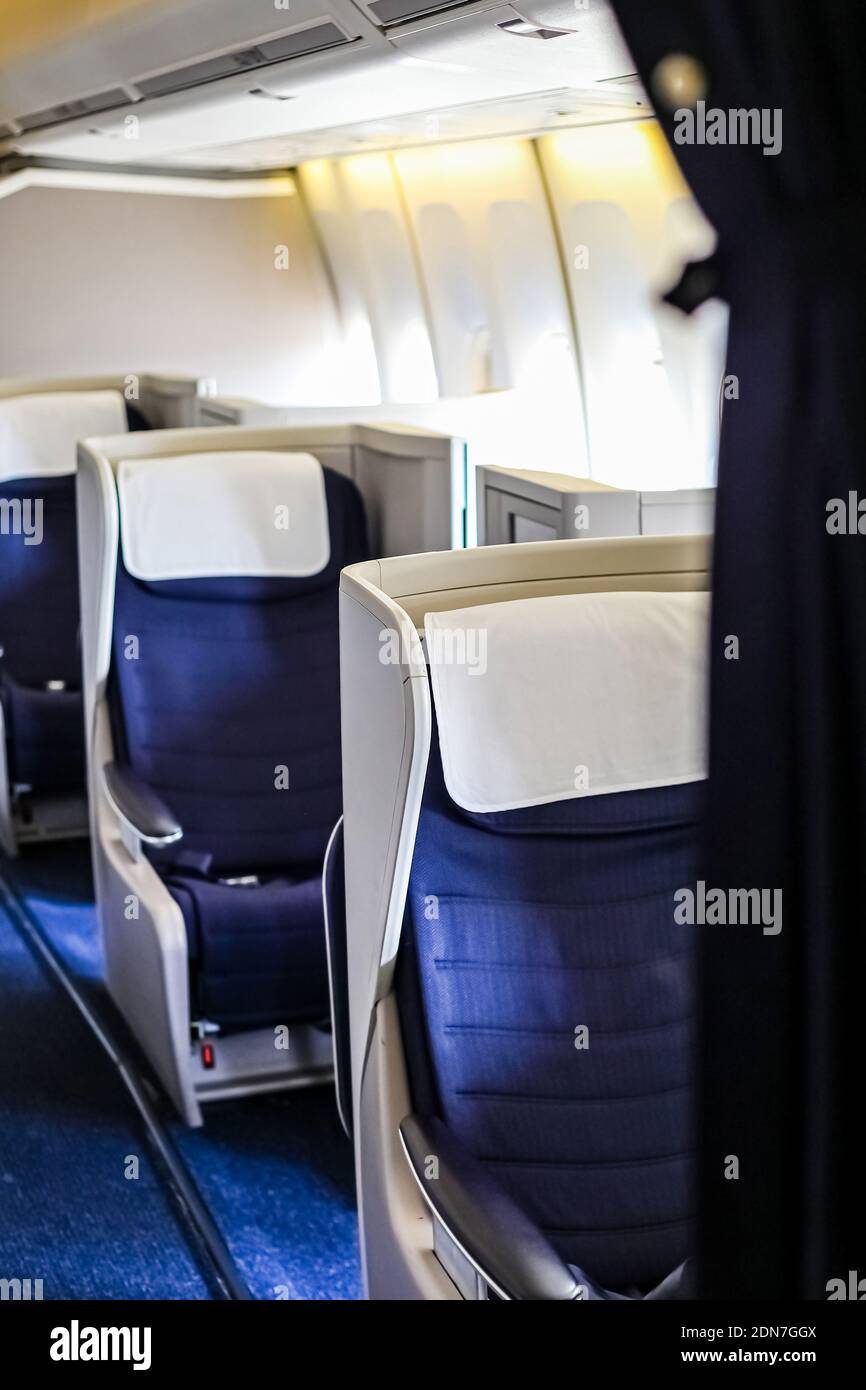 Empty 1st business class seats on the airplan Stock Photo - Alamy