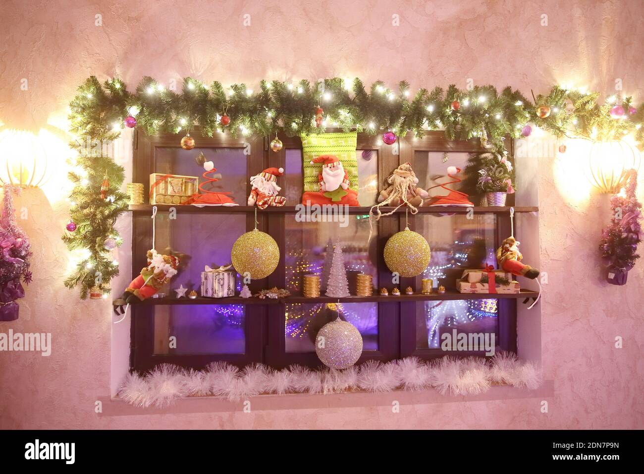 vintage decorative shelf with Christmas decorations on the wall Stock ...