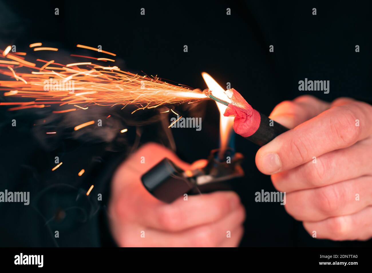The Firecracker in a Hand. Man Holding a Burning Petard in His Hand. A ...