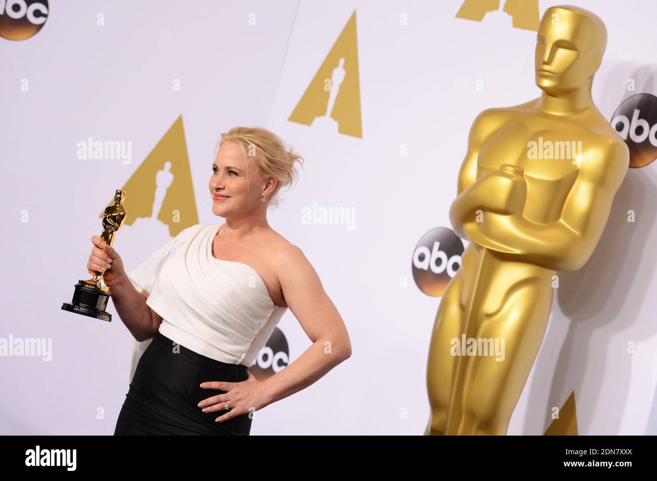 Patricia Arquette poses in the press room during the 87th Annual ...