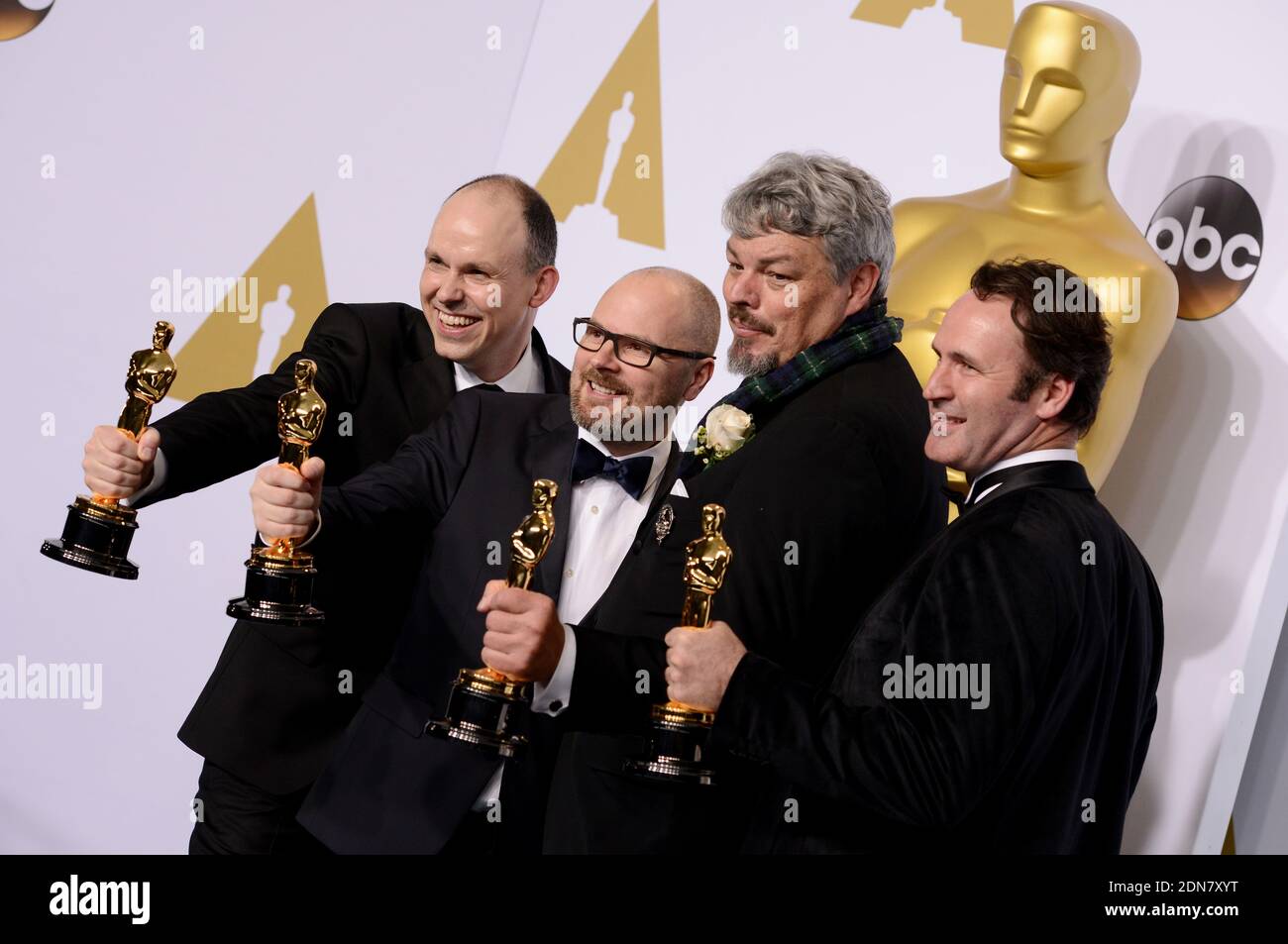 Andrew Lockley, Ian Hunter, Scott R. Fisher and Paul Franklin pose in ...