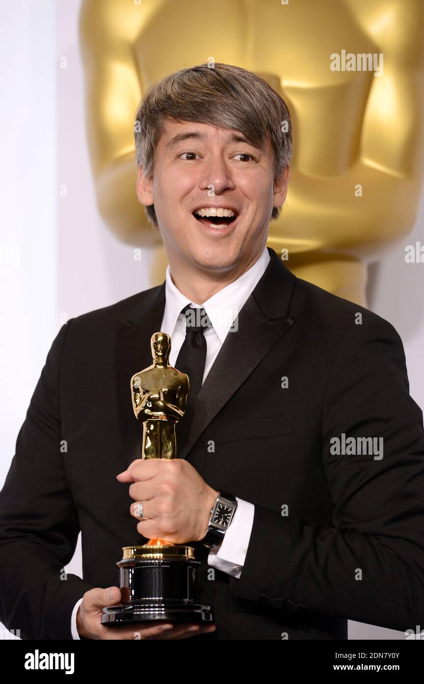 Tom Cross poses in the press room during the 87th Annual Academy Awards ...