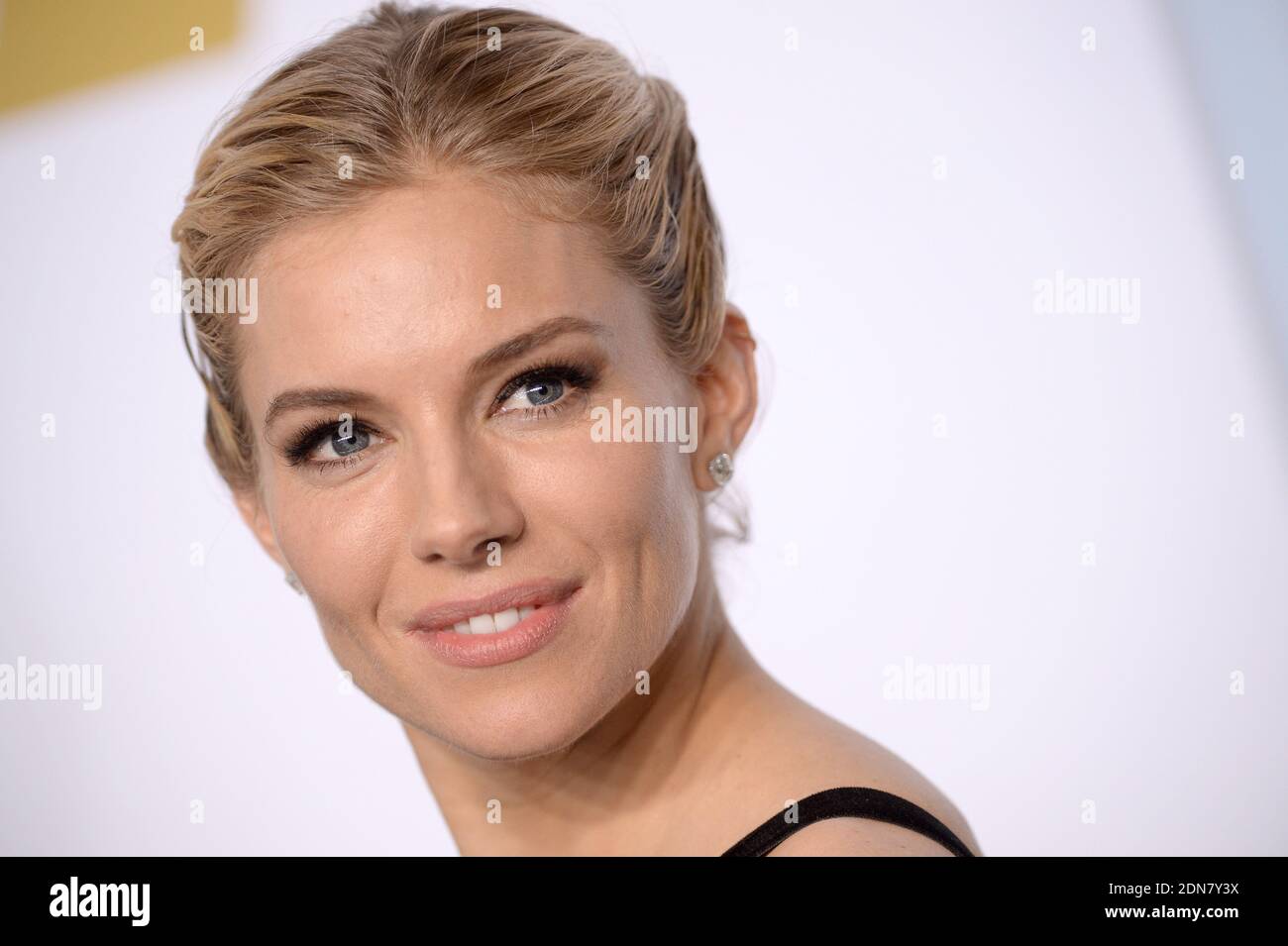 Sienna Miller poses in the press room during the 87th Annual Academy ...