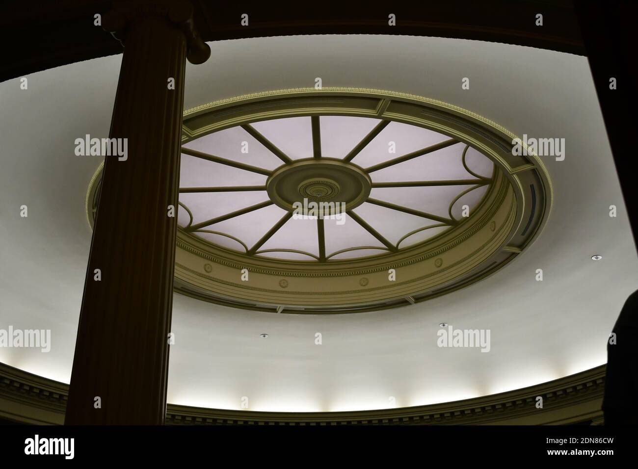 A low angle shot of a circle-shaped window on the ceiling Stock Photo ...