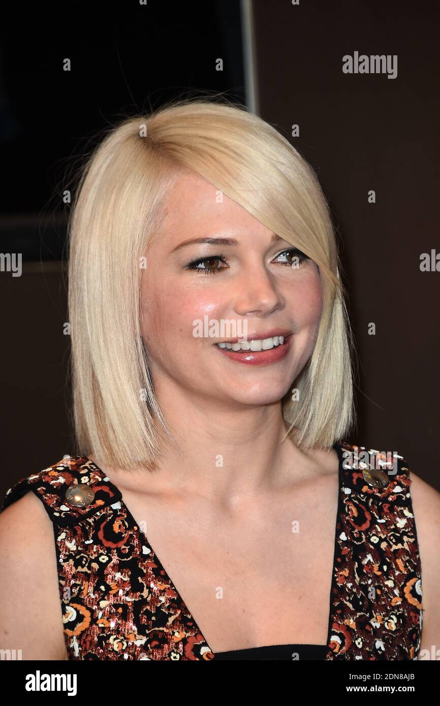 Michelle Williams attending the premiere of the film 'Suite Francaise ...