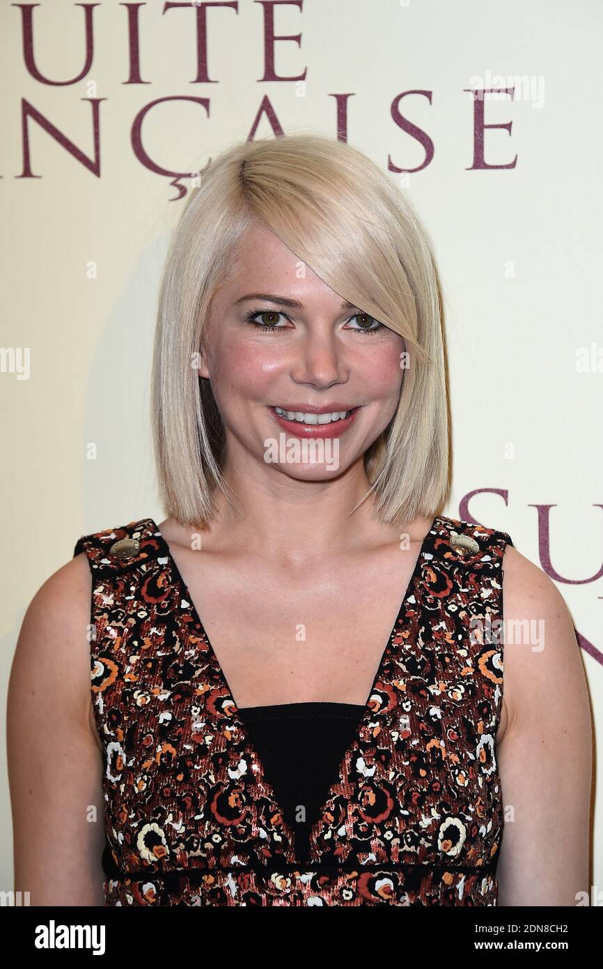 Michelle Williams attending the premiere of the film 'Suite Francaise ...