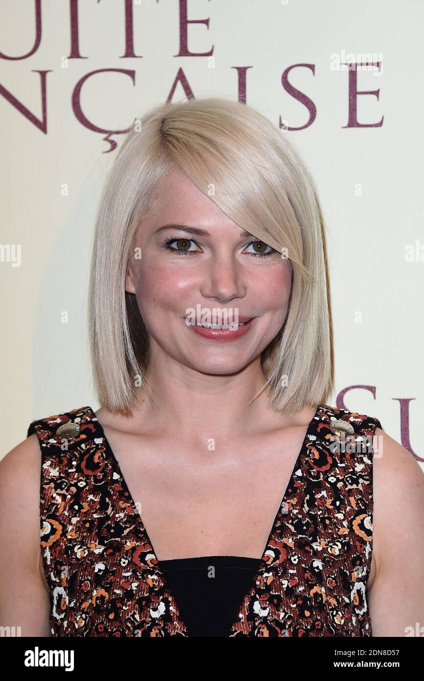 Michelle Williams attending the premiere of the film 'Suite Francaise ...