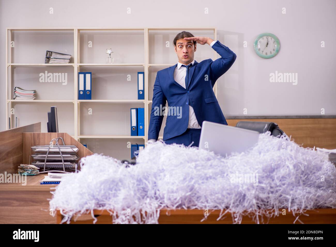 Paper shredder employee hi-res stock photography and images - Alamy