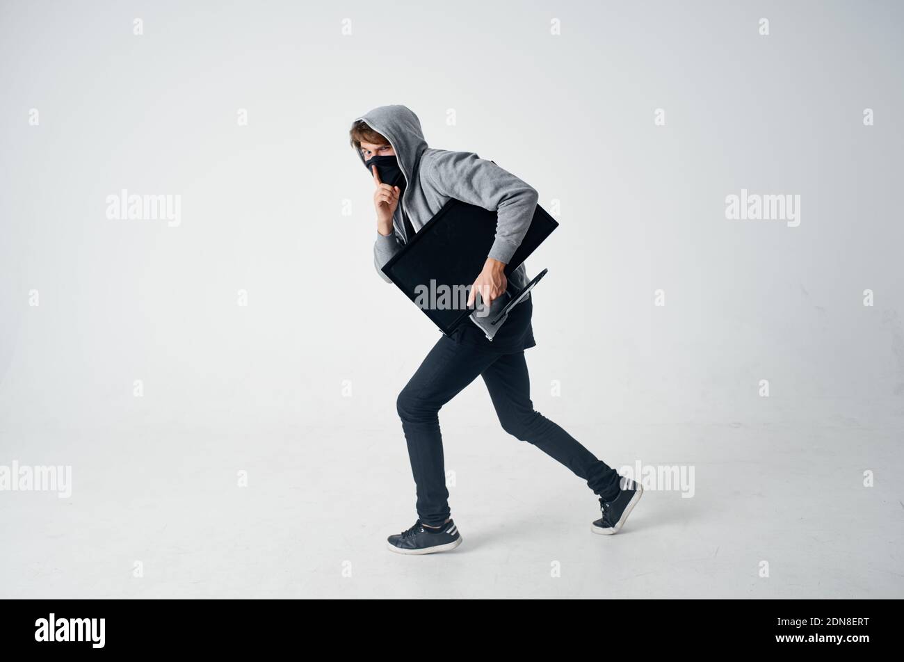 man hidden mask with hood on his head computer monitor theft stealth ...