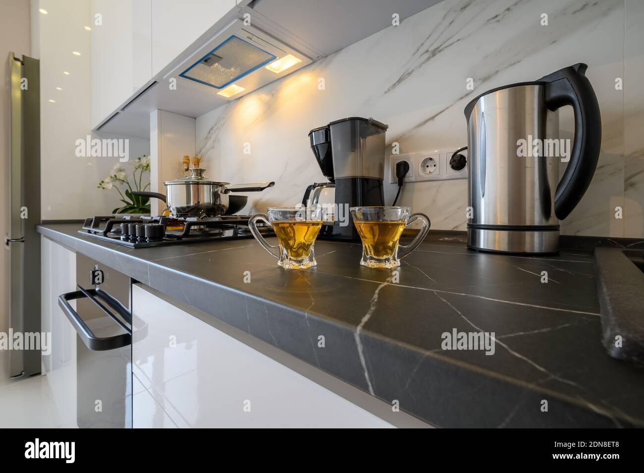 Closeup to modern kitchen cupboard Stock Photo - Alamy