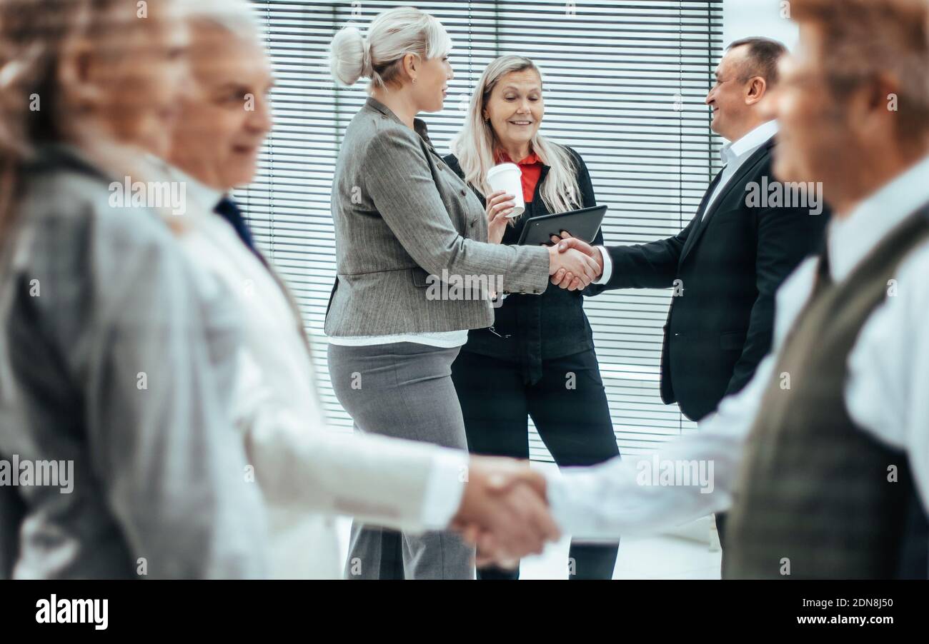 business people shaking hands in the Bank office Stock Photo - Alamy