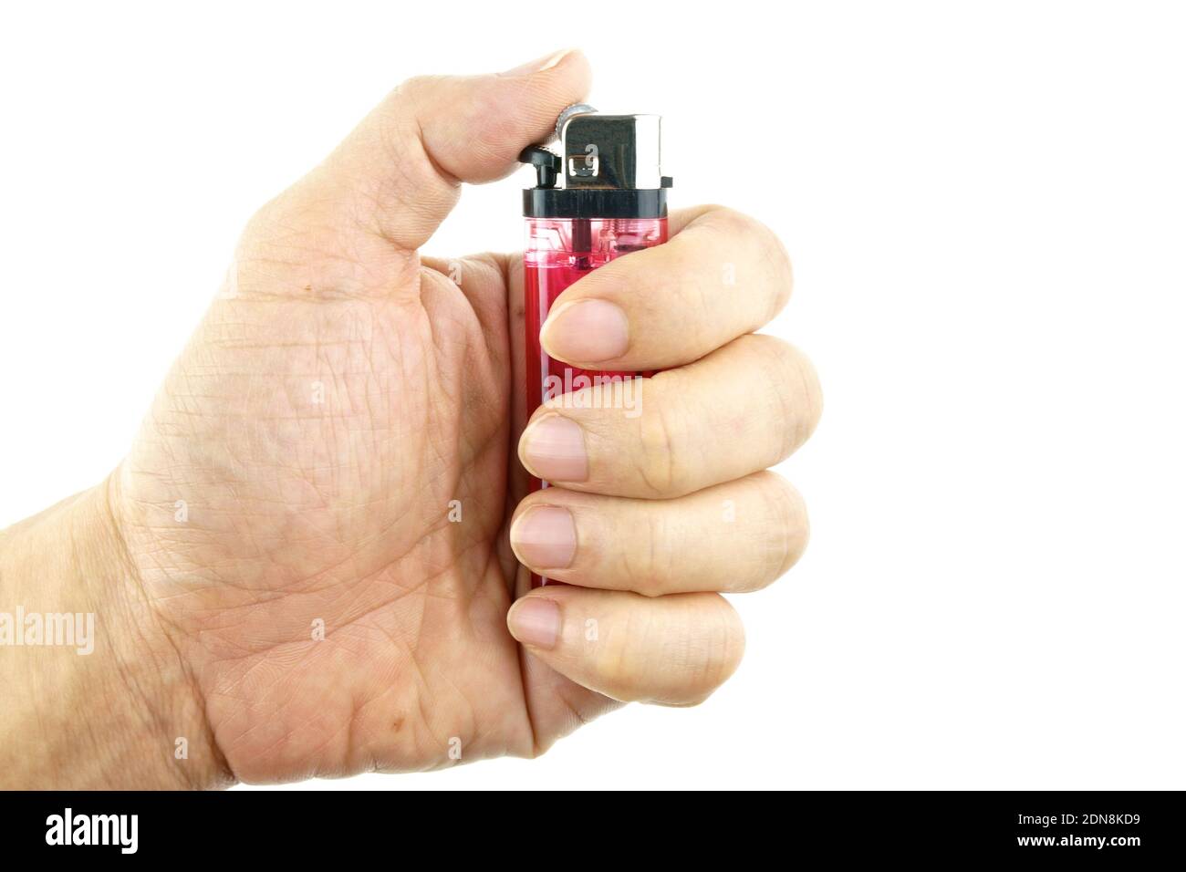 Close-up Of Hand Holding Cigarette Lighter Against White Background ...