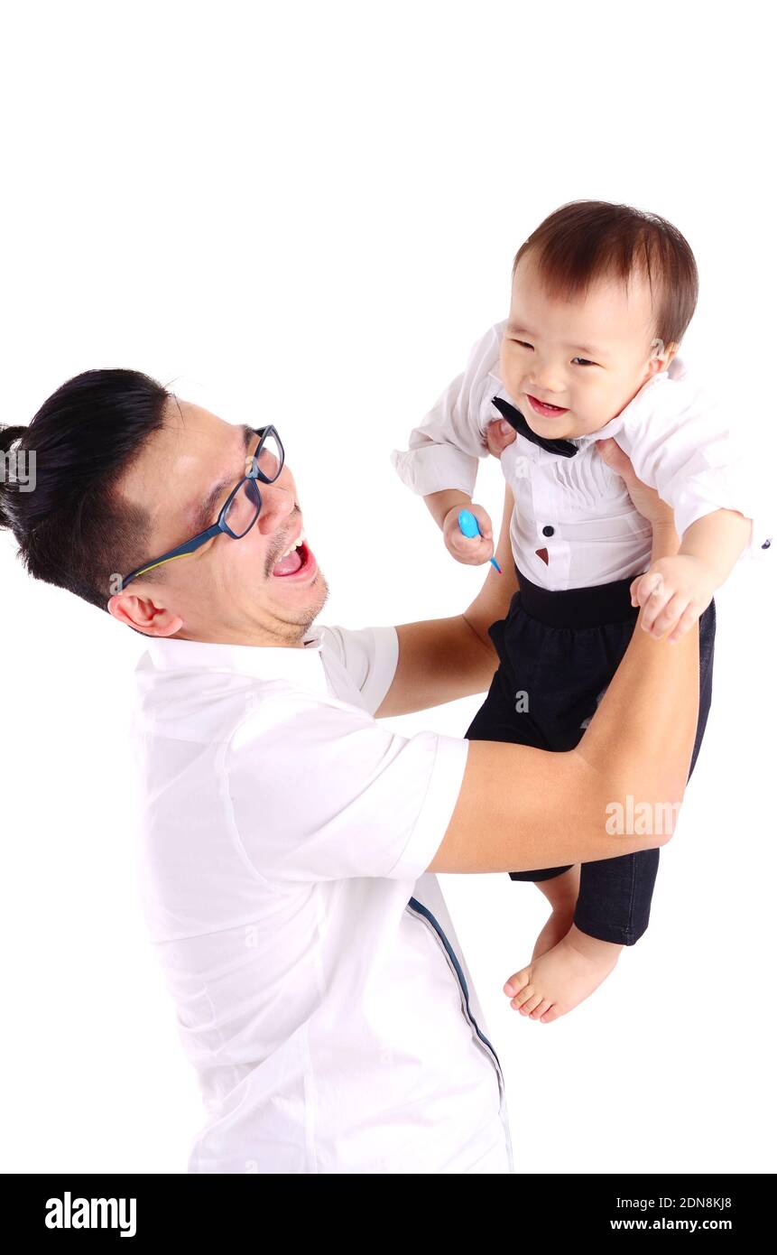 Indian child lifting hi-res stock photography and images - Alamy