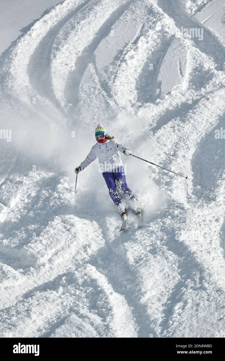 Skiing in fresh powder snow Stock Photo - Alamy