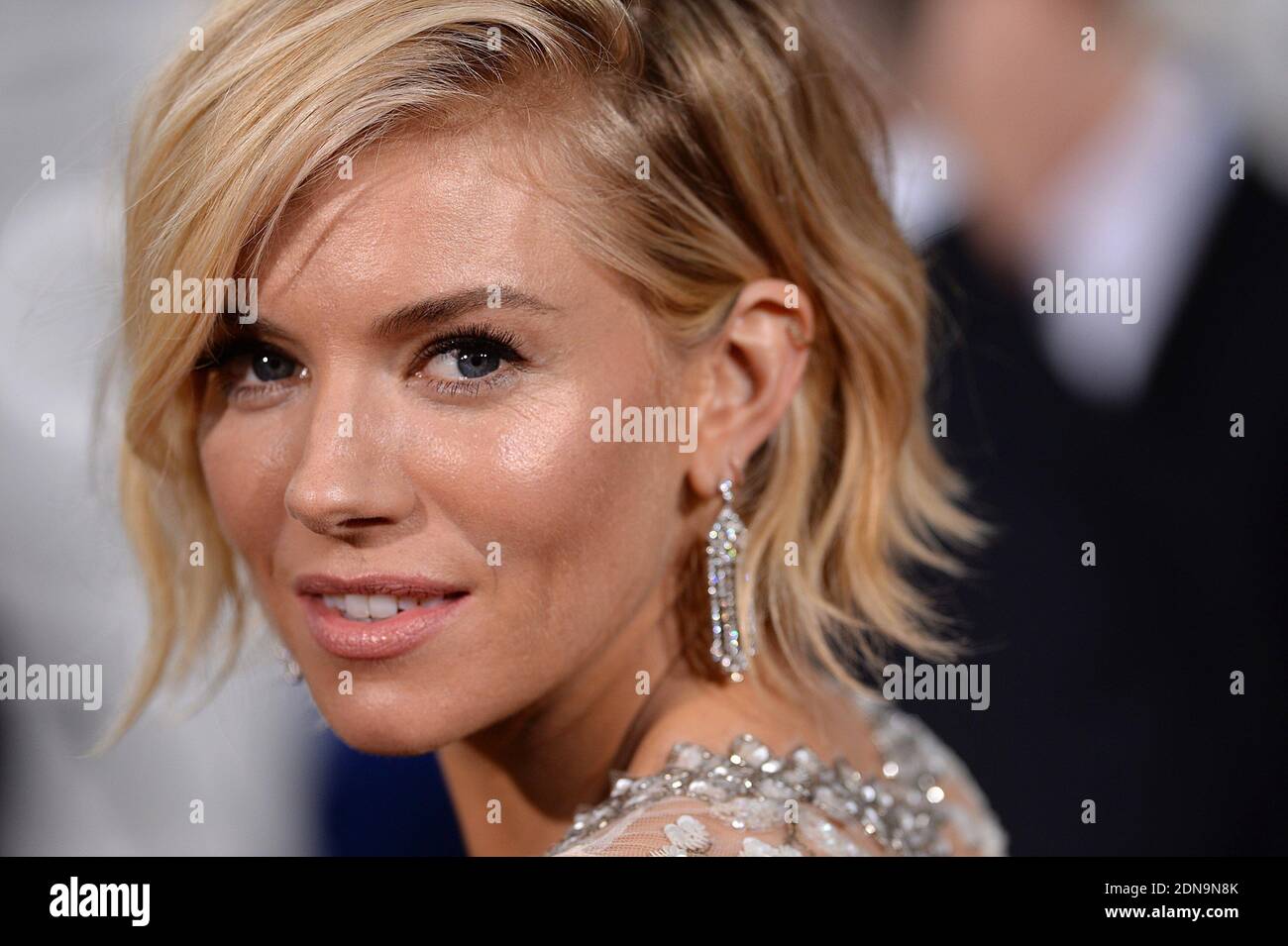 Sienna Miller arriving at the 72nd annual Golden Globe Awards held at ...