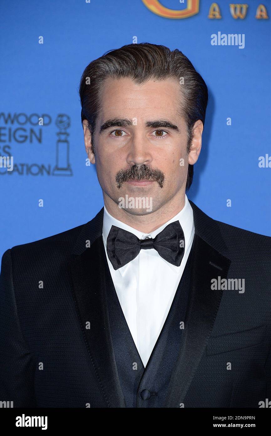 Colin Farrell posing in the press room at the 72nd annual Golden Globe ...