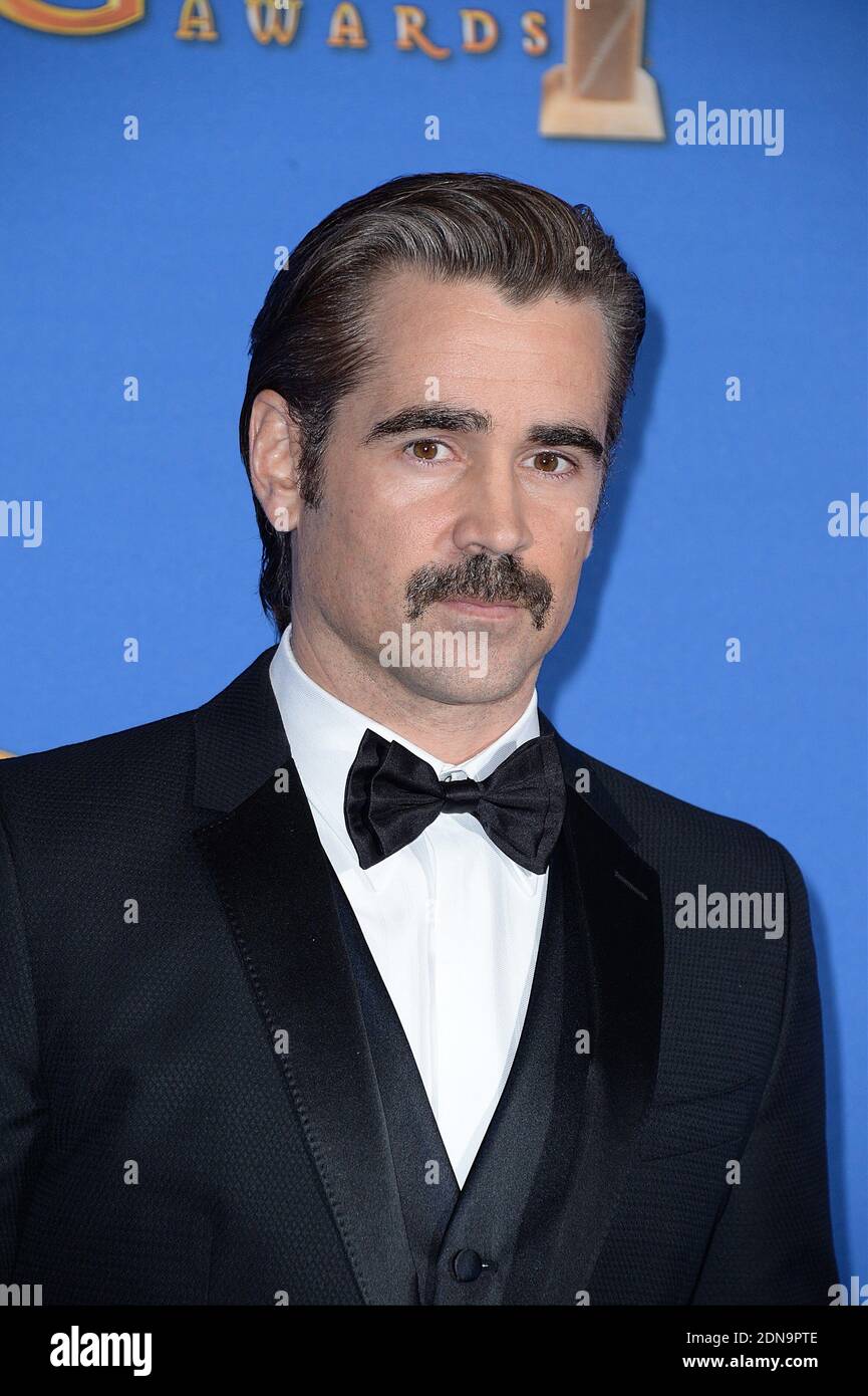 Colin Farrell posing in the press room at the 72nd annual Golden Globe ...