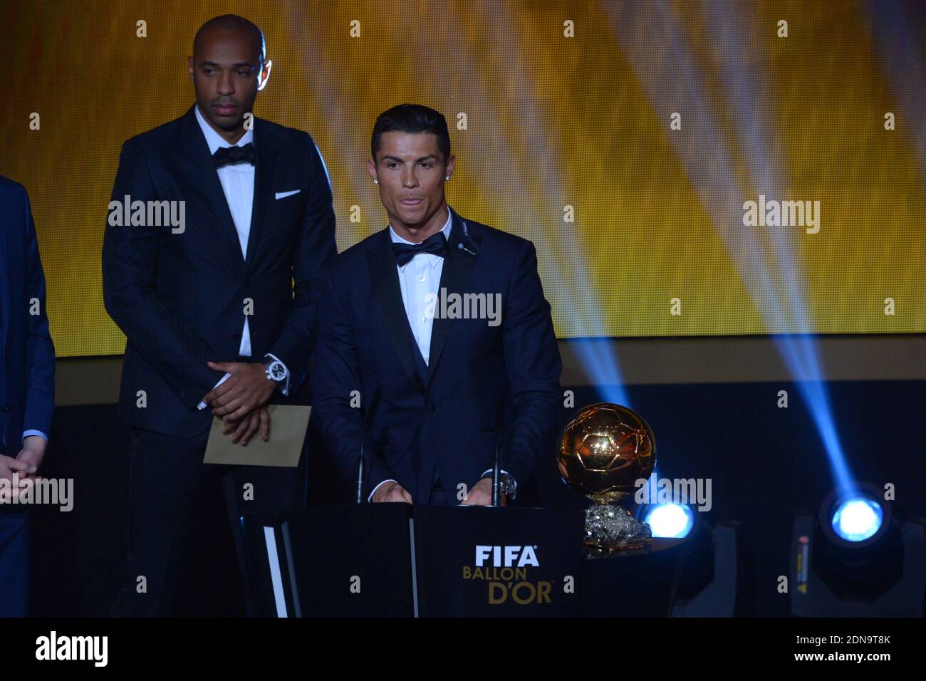 Thierry Henry giving the 2014 Ballon D'Or to Portugal's Cristiano ...
