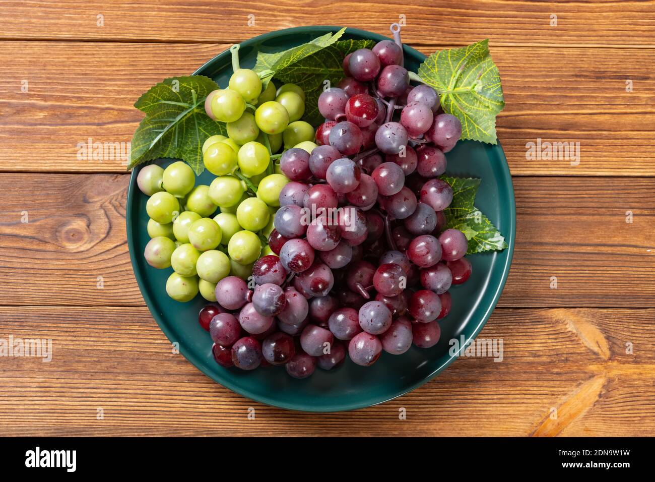 top view artificial grapes horizontal composition Stock Photo - Alamy
