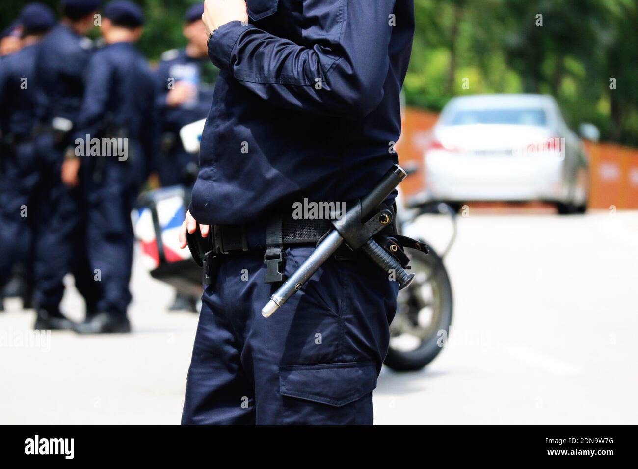 Singapore police man hi-res stock photography and images - Alamy