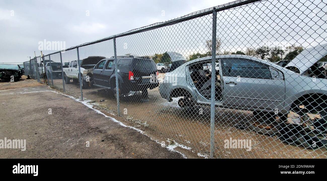 Car wrecks in a typical American junkyard, Houston, Texas Stock Photo ...