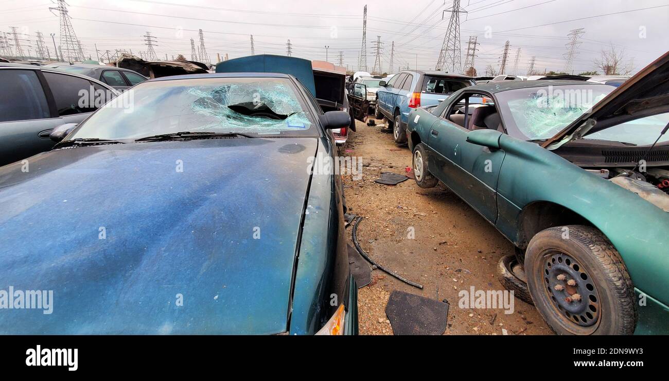 Car wrecks in a typical American junkyard, Houston, Texas Stock Photo ...