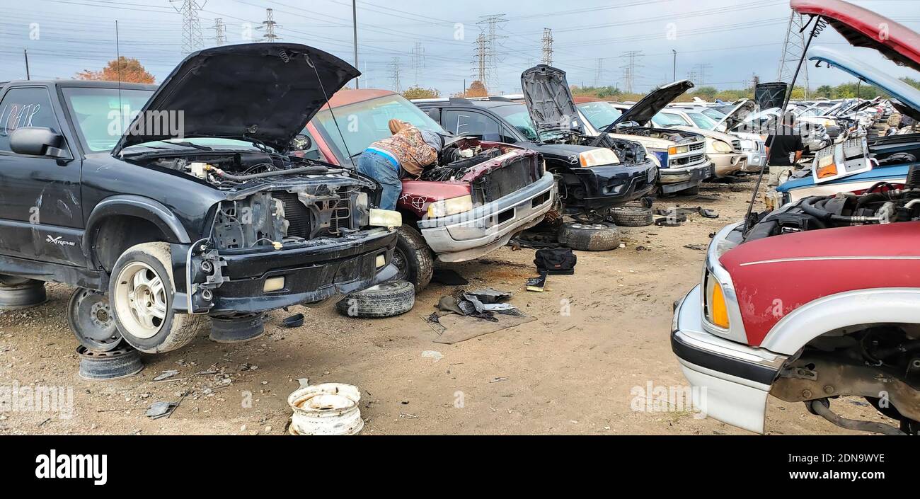Car wrecks in a typical American junkyard, Houston, Texas Stock Photo ...