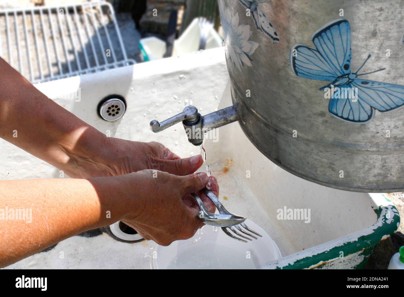 Retro hand washing at sink hi-res stock photography and images - Alamy