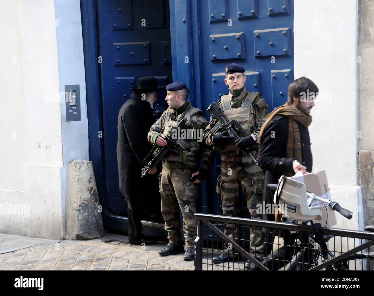 French Army soldiers stand guard outside jewish school Yad Mordekhai ...